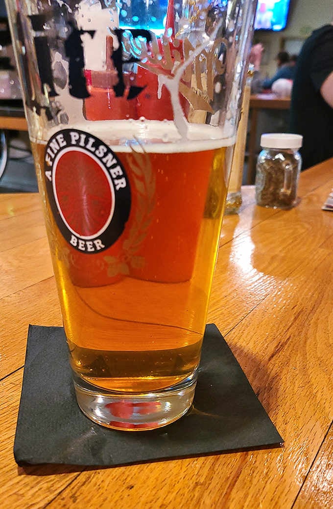 Amber liquid gold catches the light in a proper pint glass. Nothing pairs better with hearty northern Minnesota fare than a well-poured beer.