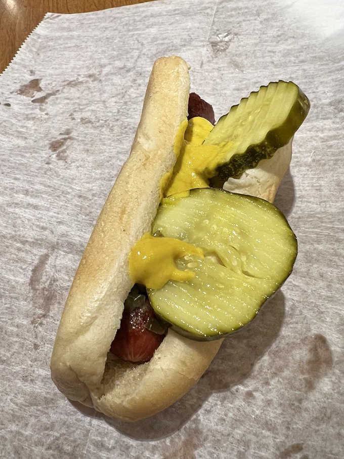 Chicago's hot dog tradition honored properly &ndash; yellow mustard, bright pickle, and absolutely no ketchup in sight, as the hot dog gods intended.