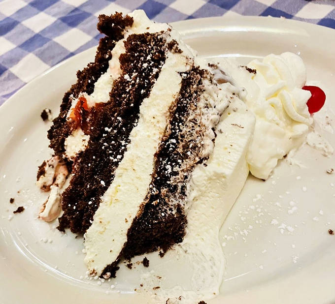 Layers of chocolate cake, whipped cream, and cherries create the namesake Black Forest Torte &ndash; dessert architecture that's almost too beautiful to eat. Almost.