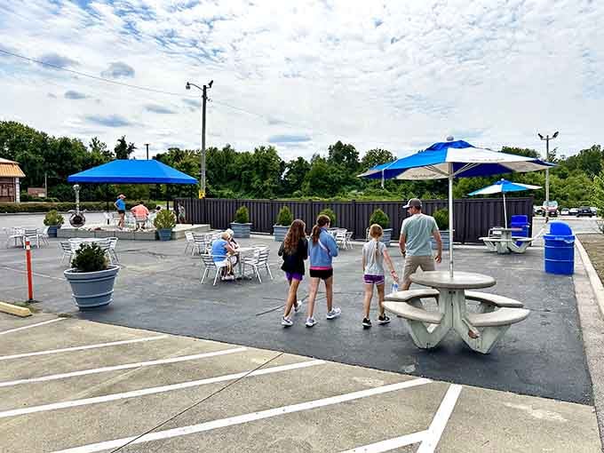 The outdoor seating area where strangers become friends over the universal language of frozen custard.