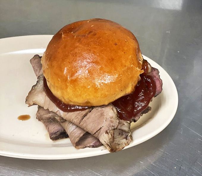 A brisket sandwich that doesn't need fancy toppings &ndash; just quality meat, sauce, and a bun that knows its supporting role.