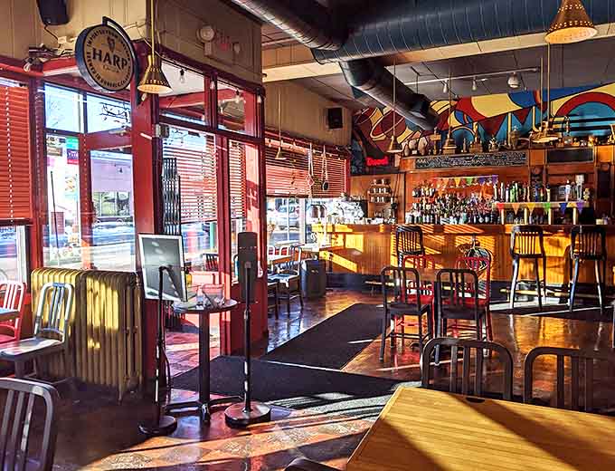 Warm lighting bathes the dining area in a golden glow, creating the perfect atmosphere for both first dates and old friends.