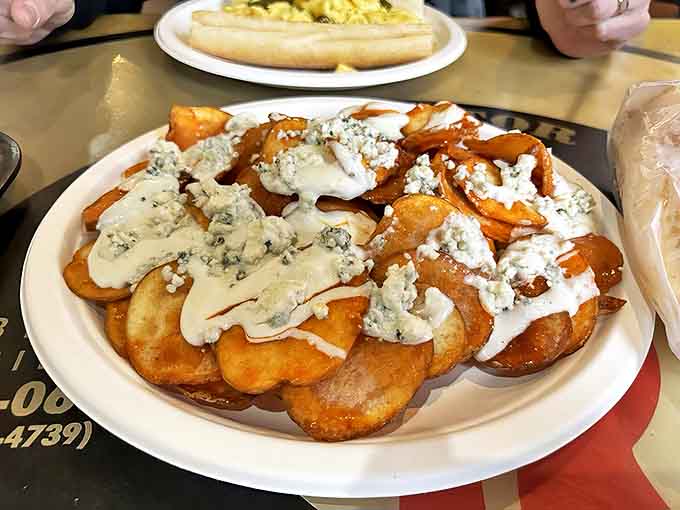 Buffalo chips arrive golden and crispy, topped with blue cheese that'll make your taste buds do a happy little dance.
