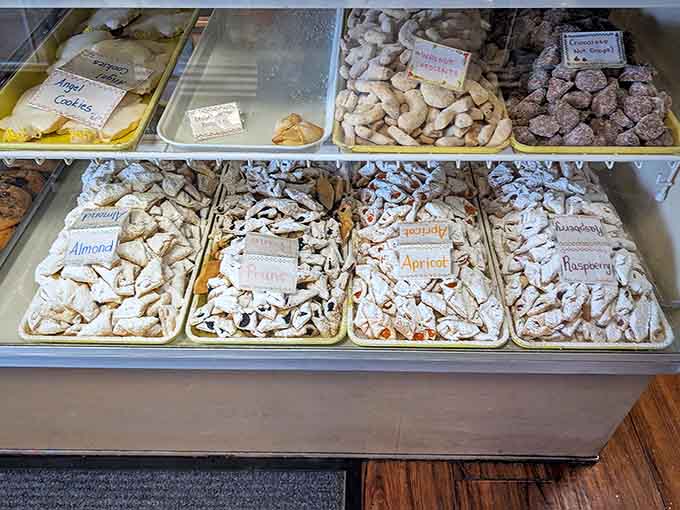 This rainbow of cookies sorted by flavor looks like someone organized happiness into neat little rows of sugary perfection.