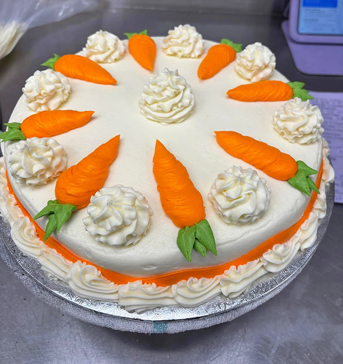 This carrot cake isn't just dessert; it's an edible garden party, where cream cheese frosting meets decorative carrots in a celebration of "vegetables for dessert" legitimacy.