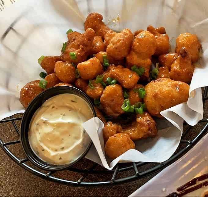 Caulibites transform humble cauliflower into addictive golden morsels that disappear from plates faster than you can say "just one more."