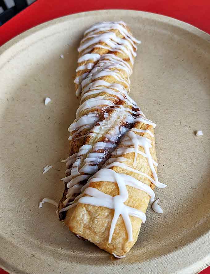 The cinnamon twist &ndash; a sweet finale that proves Mr. Foisie's mastery extends beyond savory offerings to this sugar-glazed pastry perfection.