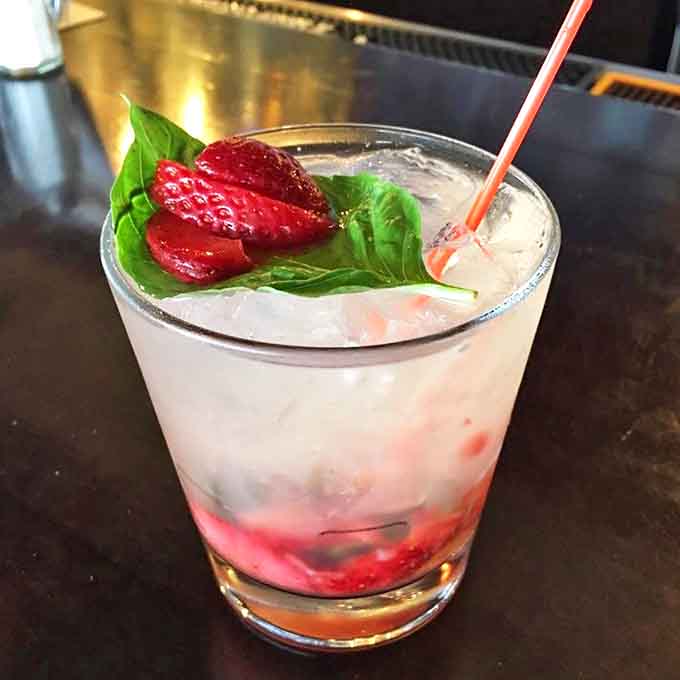 Their strawberry basil cocktail isn't just a drink, it's a summer afternoon in liquid form &ndash; fresh, bright, and just the right balance of sweet and herbaceous.