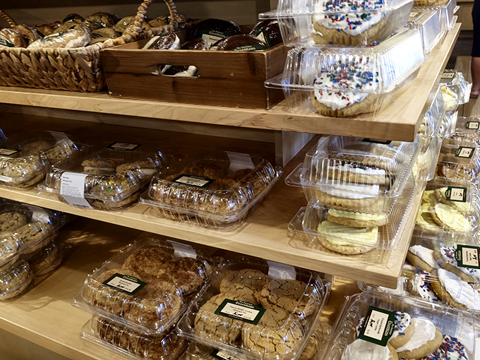 The cookie selection tempts from behind clear display cases, each one promising the kind of homemade goodness that makes willpower crumble faster than the cookies themselves.