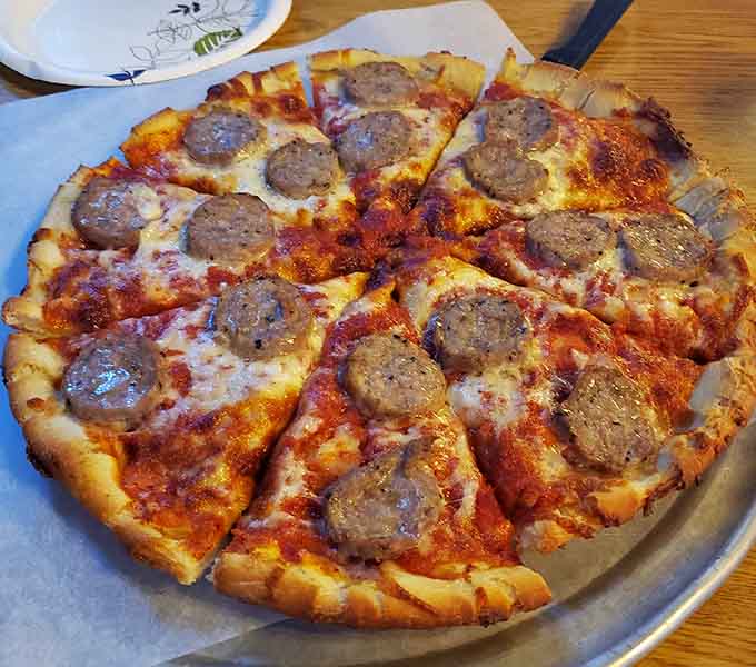 Sausage pizza loaded with generous toppings shows this isn't a place that skimps on the good stuff or your appetite's expectations.