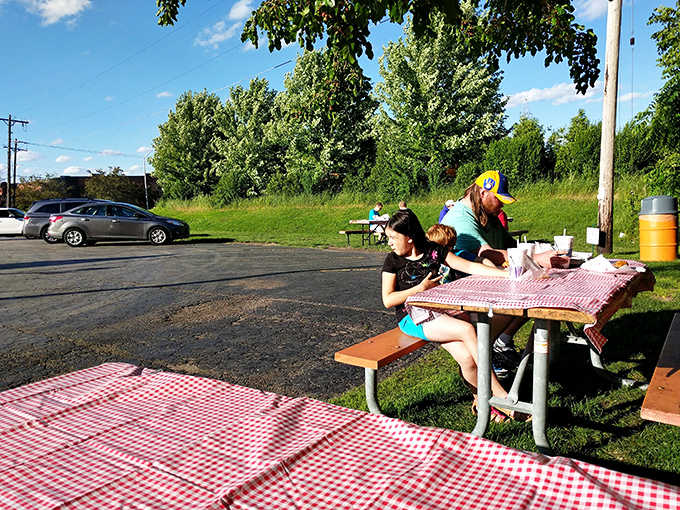 The dining room buzzes with the energy of satisfied customers &ndash; a community united by great pizza.