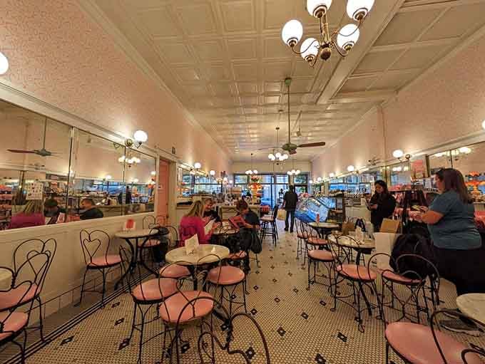 Families gather in this pink-hued sanctuary of sweetness, creating memories that will outlast even the most persistent chocolate stain.