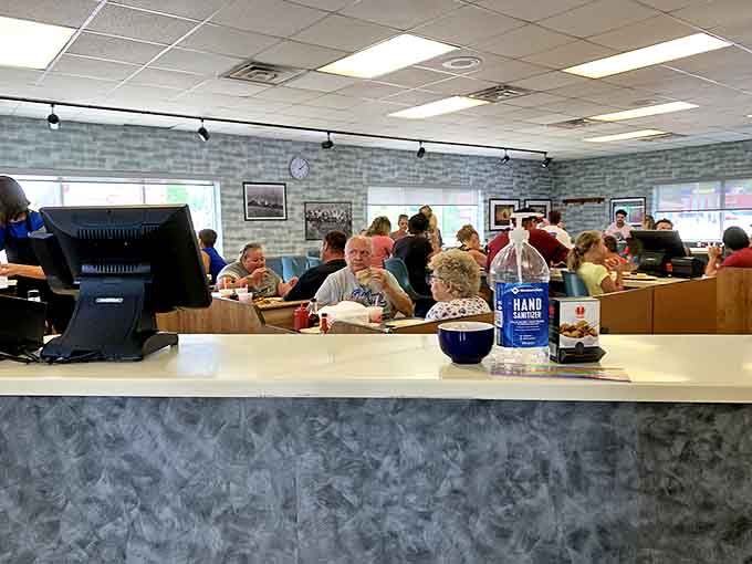 Where strangers become friends over shared tables and the symphony of conversation drowns out the world outside.