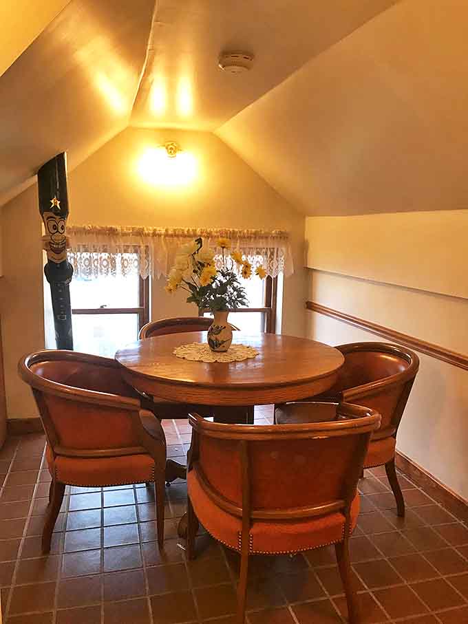 That gorgeous round table with leather chairs under vaulted ceilings makes you forget you're dining in a former county jail building.