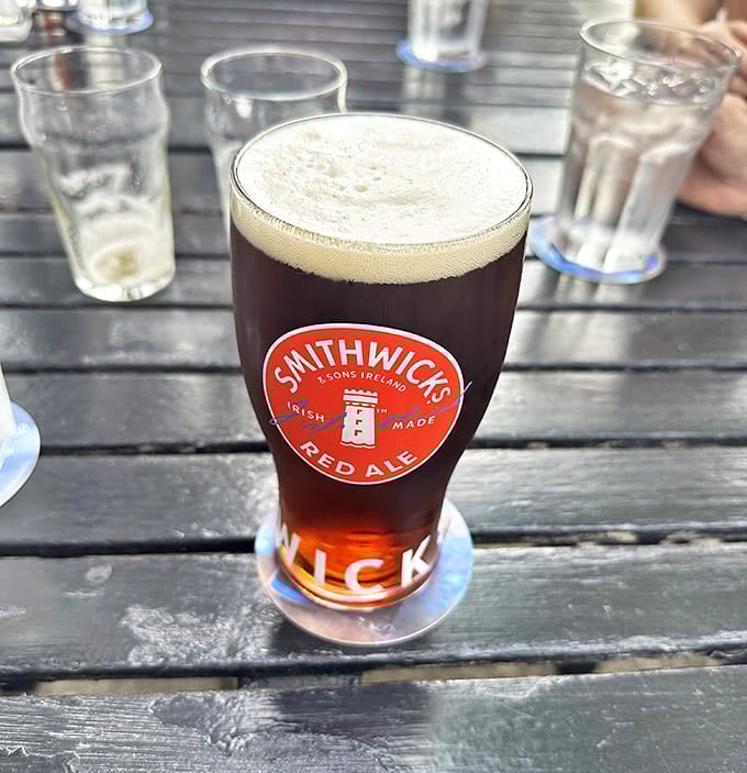 Coffee served in a no-nonsense cup with a sleeve that says it all: they take their brew seriously here.