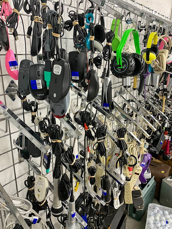 The electronic peripherals wall &ndash; where forgotten tech gadgets hang hopefully, waiting for someone who still owns that 2007 laptop.