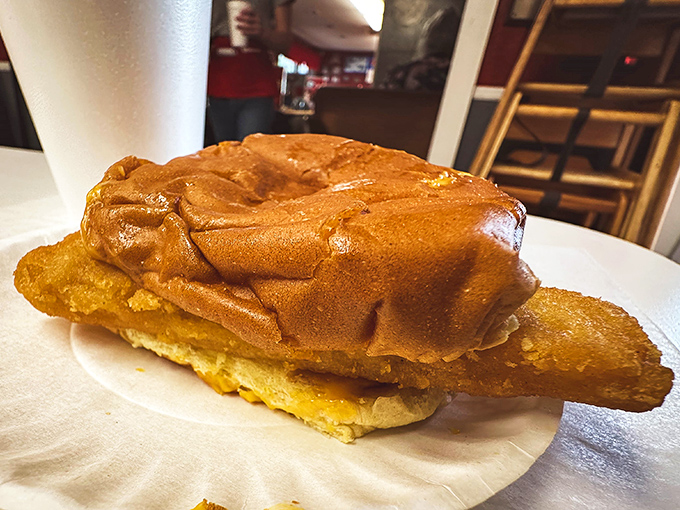 The fish sandwich hanging off both sides of the bun &ndash; proof that Hickie's excellence extends beyond their legendary burgers.
