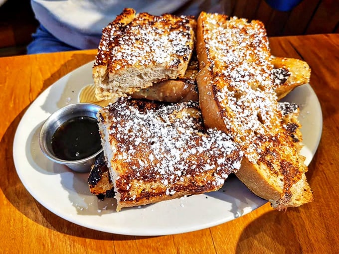 French toast that actually lives up to the "French" in Frenchies – golden, crisp edges giving way to custardy centers that'll make you weak in the knees.