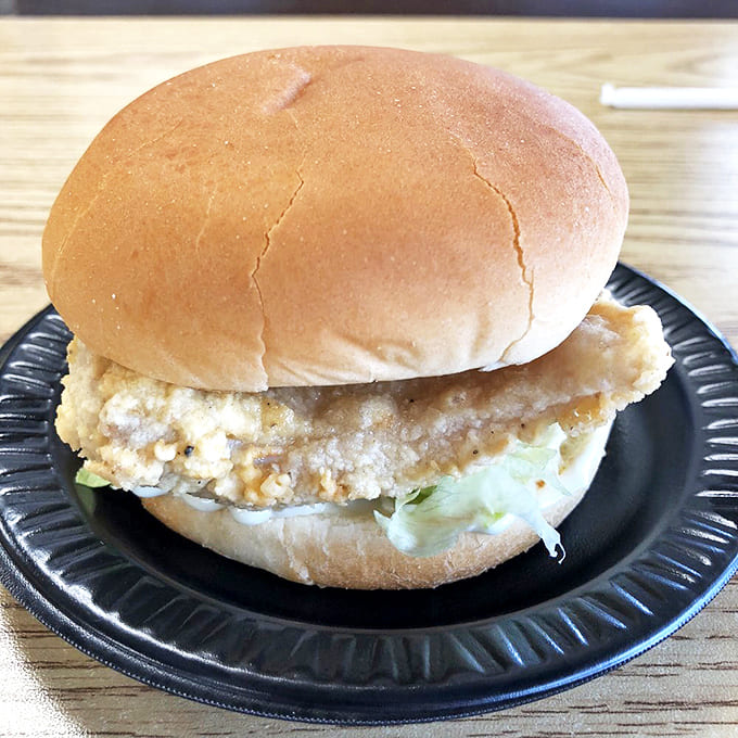 Simplicity elevated to art form &ndash; a perfectly fried chicken breast on a soft bun with just enough lettuce for color.
