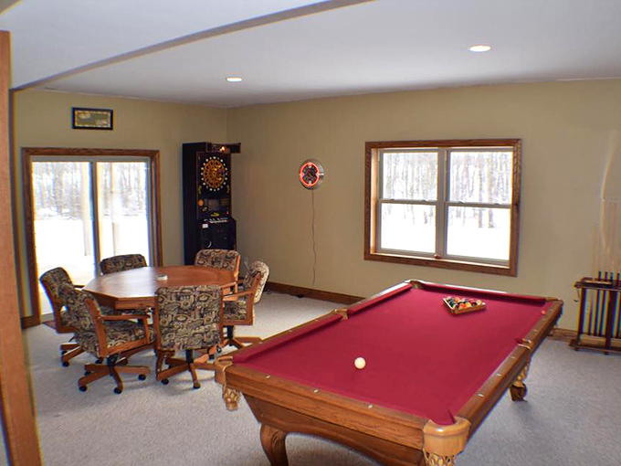 Challenge accepted! The game room's pool table stands ready for friendly competition when outdoor adventures wind down for the day.