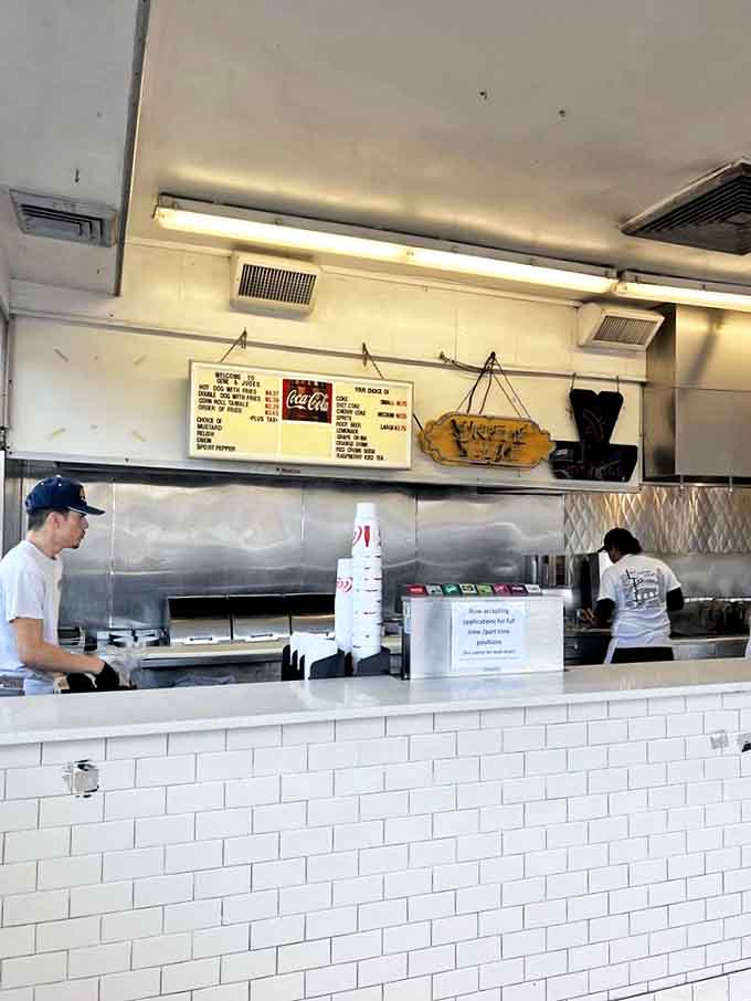 The counter where magic happens and orders fly faster than a Cubs fan's hopes in October, efficient and utterly without pretension.