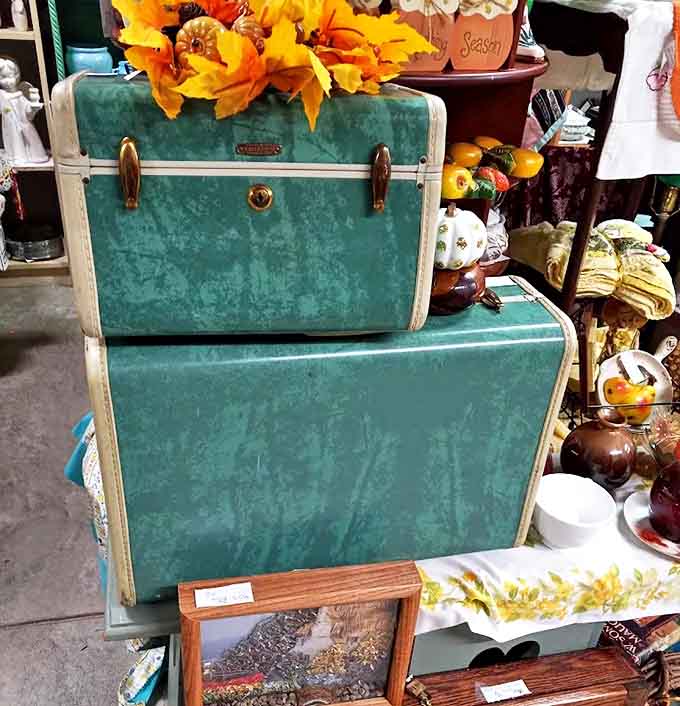 Vintage suitcases in that impossible-to-forget turquoise &ndash; from an era when travel was an occasion and luggage was built to last.
