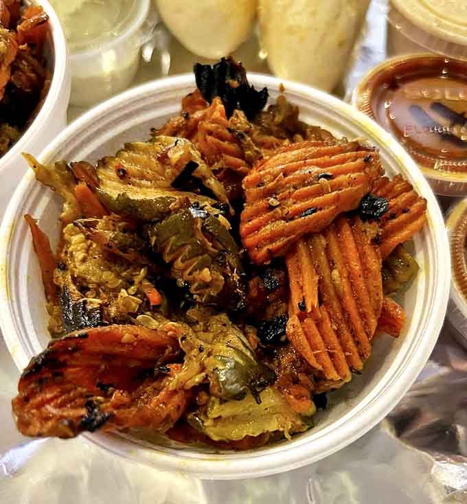 Grilled vegetables with beautiful char marks prove that Q Fanatic's mastery extends beyond meat to everything that touches their grill.