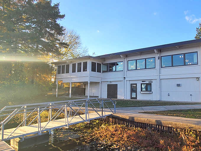 The park's community building stands ready to welcome visitors, its clean lines and bright windows promising shelter and information.