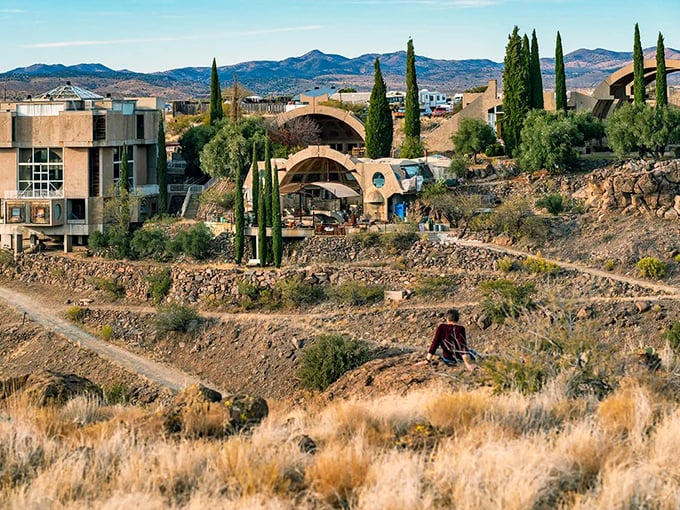 The hillside community blends into the landscape while simultaneously standing out &ndash; a contradiction in concrete and cypress.