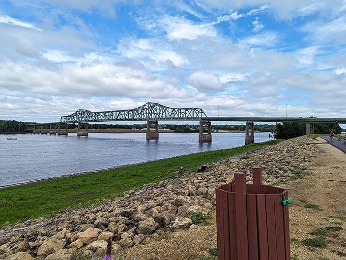 The Mississippi River flows majestically past Fulton, a liquid highway that has shaped the town's history, commerce, and soul since its founding.