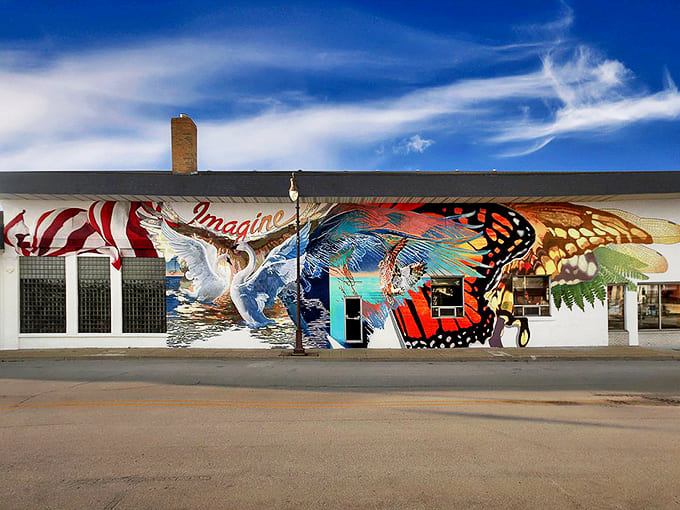 Lake Effect Arts brings vibrant creativity to Manistique's main street, where "Imagine" isn't just a mural but an invitation to dream.