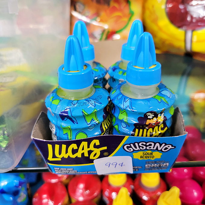 These liquid candy squeeze bottles aren't just treats – they're childhood status symbols, ready to create blue tongues and unforgettable memories.