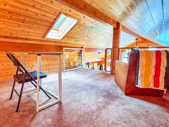 A loft space that begs for afternoon naps or morning stretches as sunlight filters through surrounding pines.