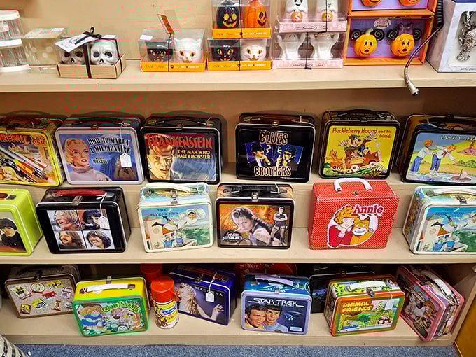 Vintage Coca-Cola bottles stand like green glass soldiers, each bearing the marks of different bottling plants across America.