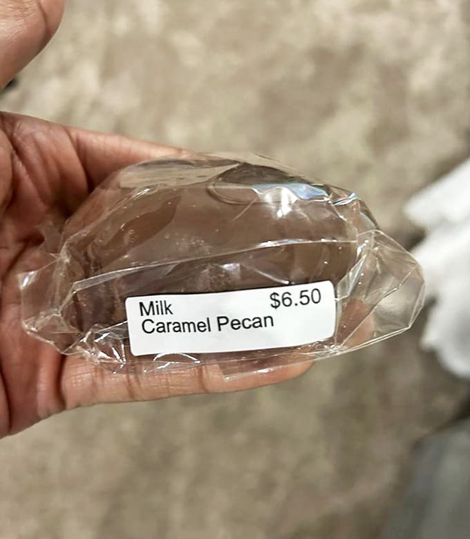 The milk caramel pecan is a masterclass in texture and flavor, combining buttery caramel, crunchy nuts, and smooth chocolate into one perfect bite.