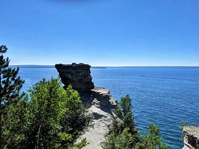 Miners Castle's distinctive profile stands defiant against time and elements &ndash; a natural sculpture constantly being refined by wind and water.