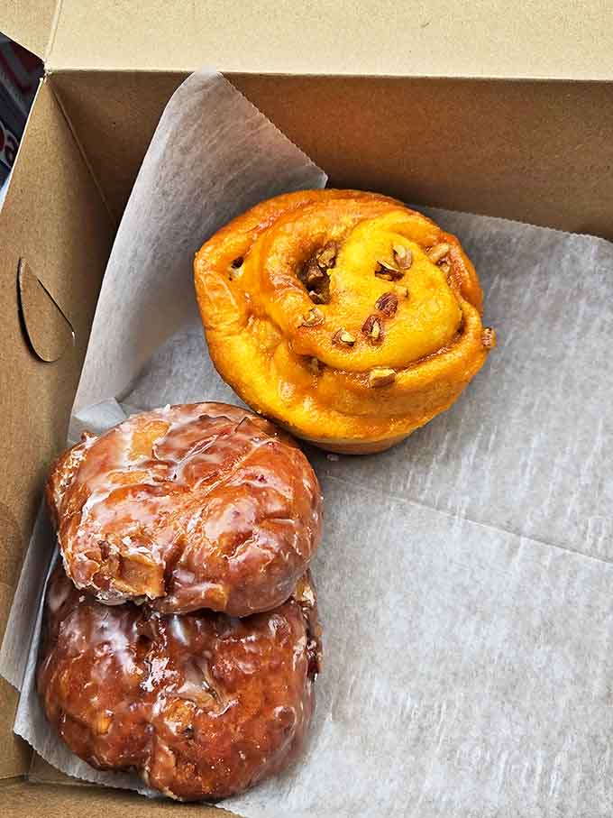 Dawn's early light reveals the true breakfast champions &ndash; glazed perfection alongside fruit-filled companions that make mornings worth facing.