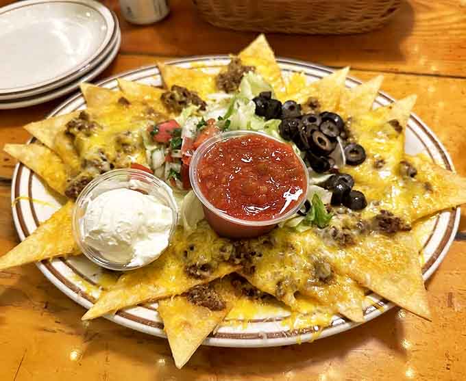Nacho ordinary appetizer: a festival of tortilla chips, seasoned beef, melted cheese, and toppings that somehow never makes it to round two.