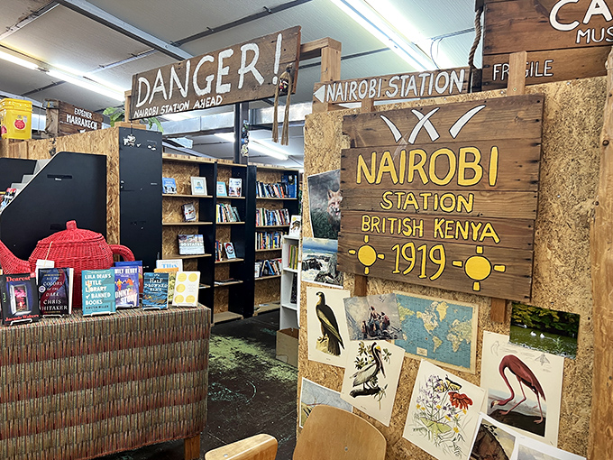 "Danger! Nairobi Station Ahead!" warns the sign, guiding literary explorers to a corner where Hemingway's ghost might still be nursing a gin.
