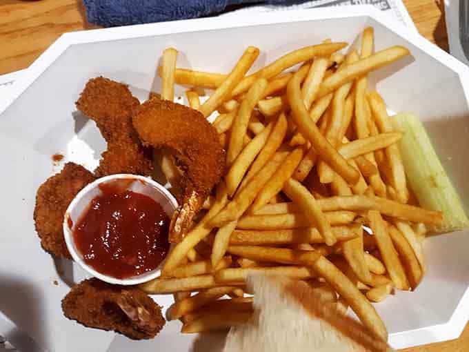 Golden breaded shrimp and a pile of fries prove this cafe doesn't play favorites, every dish gets the same loving attention.