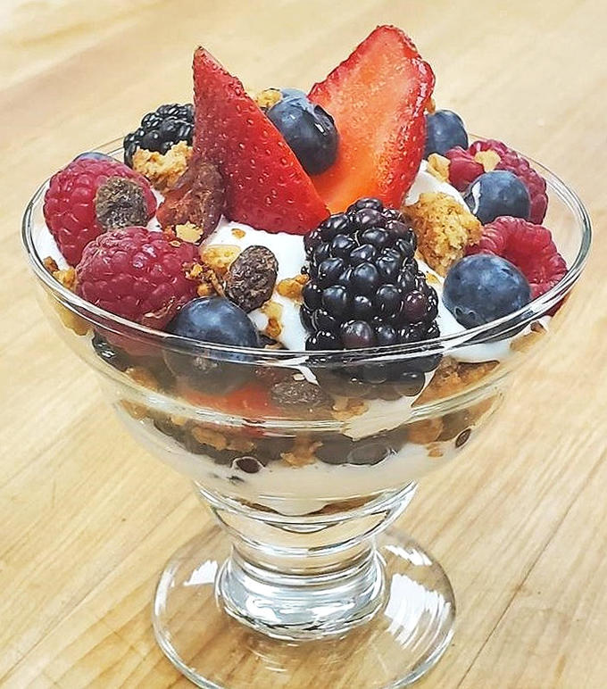 A parfait that somehow makes yogurt, berries, and granola feel like an indulgence rather than a virtuous choice.