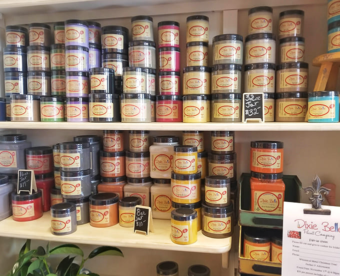 Dixie Belle paint products line the shelves like a rainbow of possibilities for your next furniture transformation project.