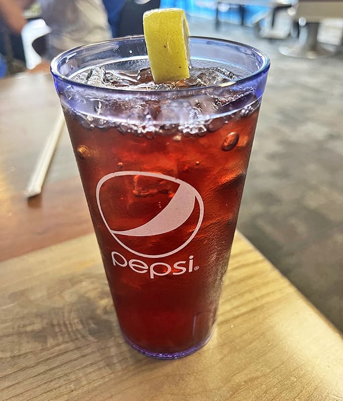 That frosty Pepsi with its lemon wedge isn't just a beverage &ndash; it's the perfect palate cleanser between bites of barbecue bliss.