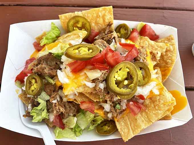 Nacho ordinary nachos – these loaded beauties feature pulled pork, melty cheese, and enough jalapeños to make you feel alive again.