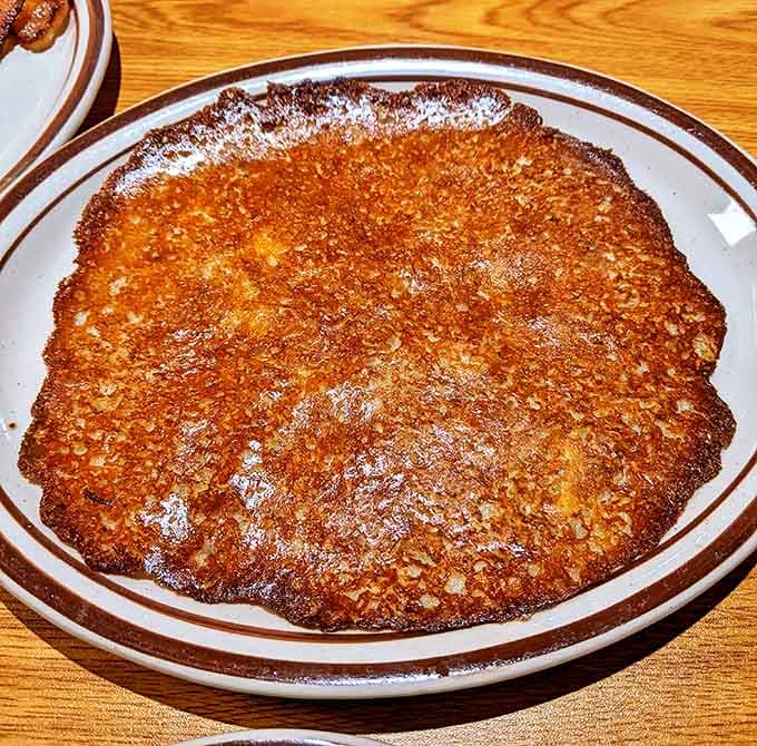Behold the potato pancake: crispy, golden-brown proof that potatoes might just be nature's perfect food, especially when transformed into this savory disc of joy.