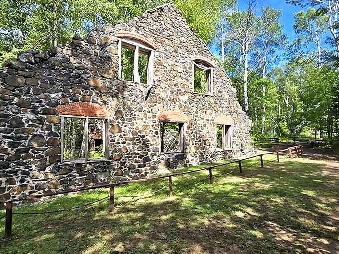 Stone walls are all that remain of the hoist house, where massive steam engines once pulled ore from the depths.