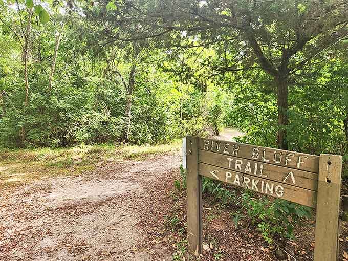 Follow the wooden sign to adventure – River Bluff Trail delivers on its promise with jaw-dropping views that reward every step.