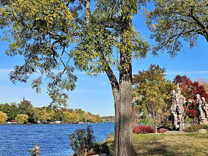 The peaceful Rock River provides the perfect backdrop for these silent sentinels, reflecting their imposing forms on calm days.