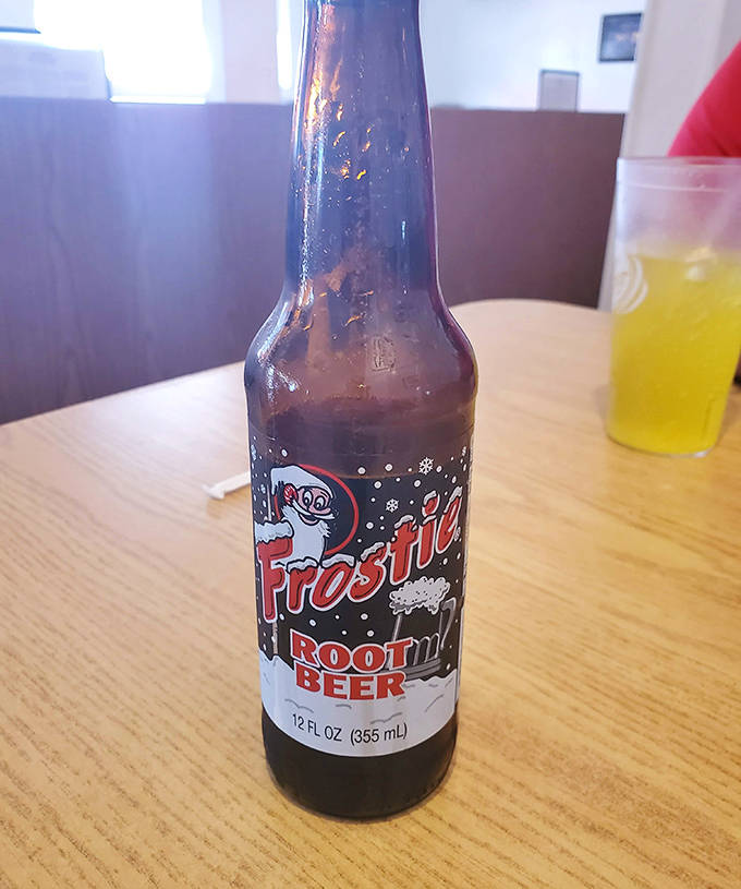 Frostie root beer in glass bottles &ndash; because some beverages simply taste better when served with a side of nostalgia and no apologies.