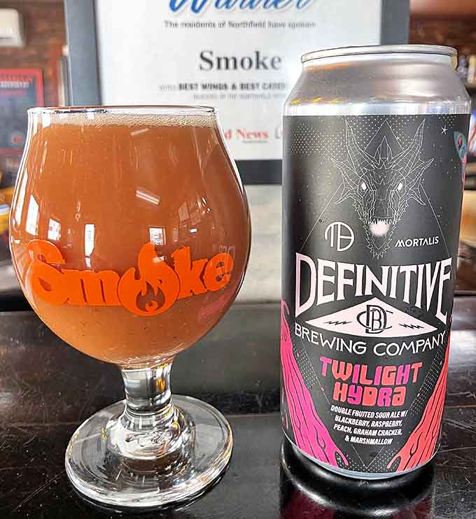 This craft sour ale's vibrant pink label hints at the flavor adventure within&mdash;tart, fruity notes that cut through rich barbecue like a refreshing breeze.